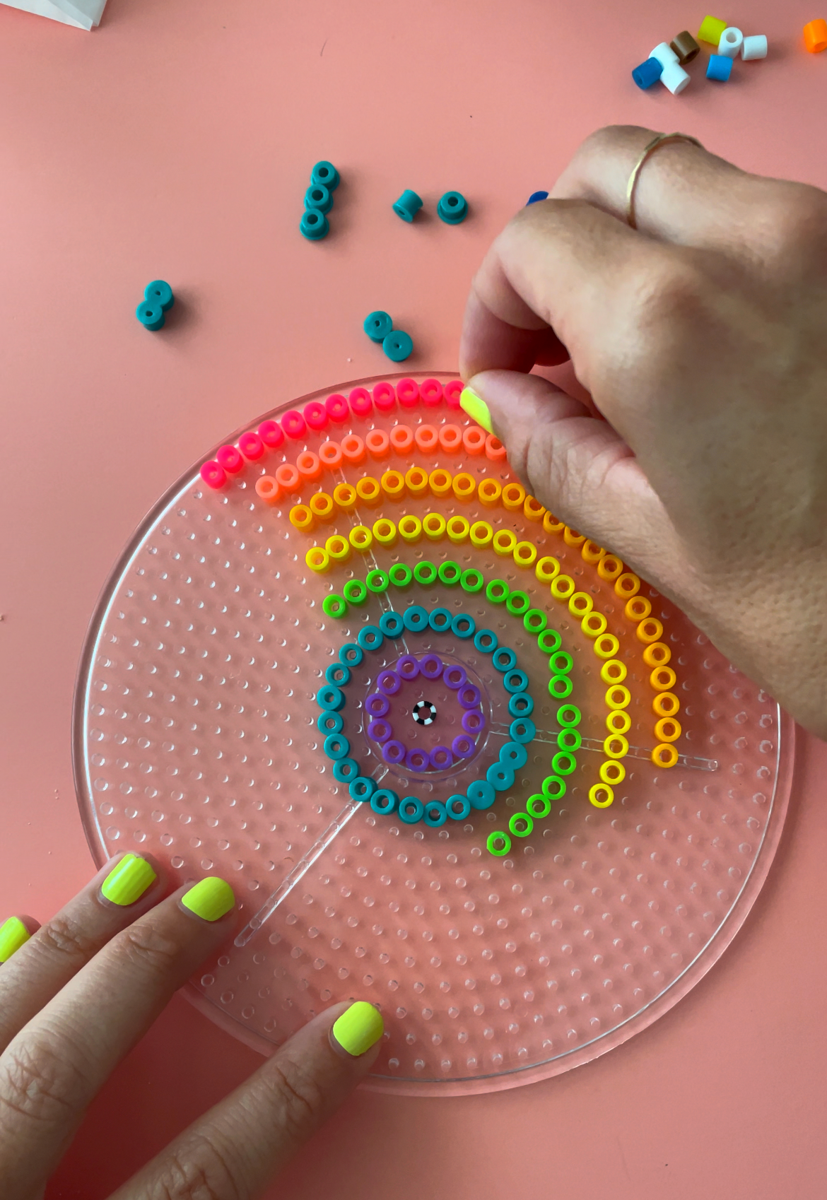 kid craft -perler bead Spinner - A girl and a glue gun