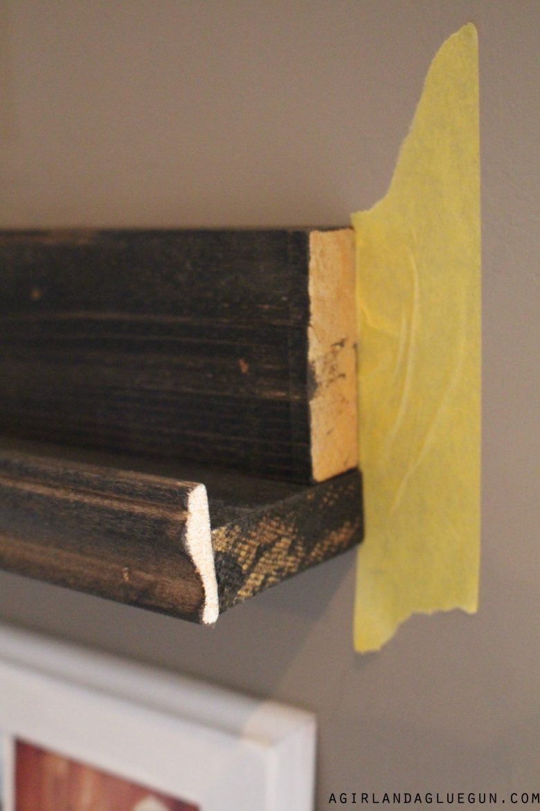 Decorating with pictures-easy diy picture ledges! - A girl and a glue gun