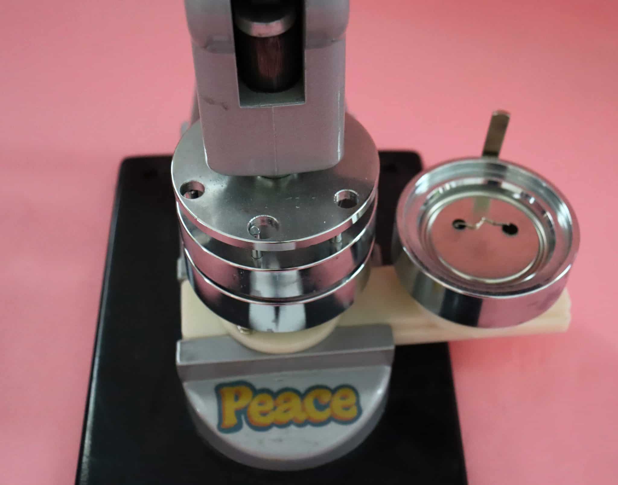 Button Maker Machine - A girl and a glue gun