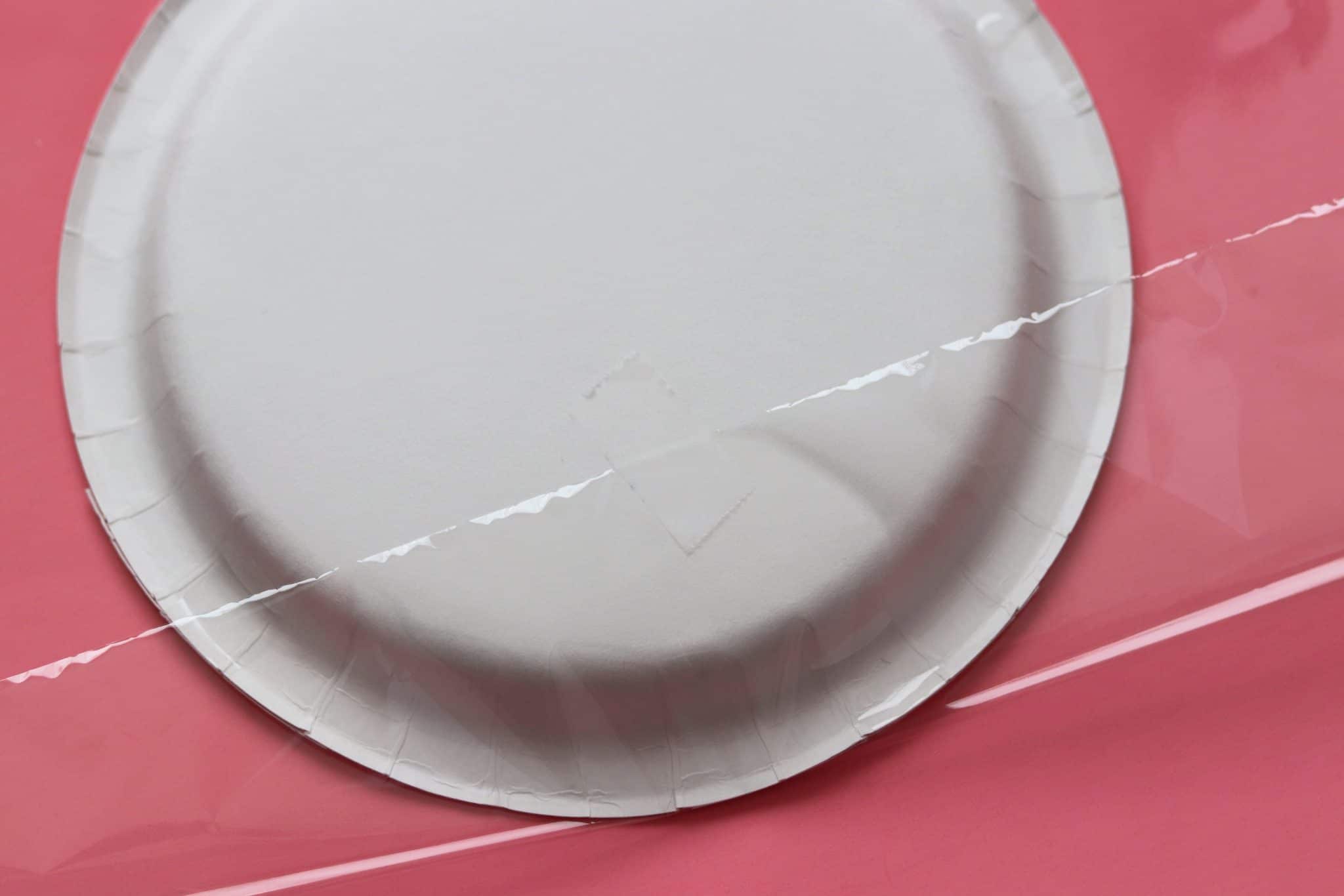 Make a peppermint candy from paper plates - A girl and a glue gun