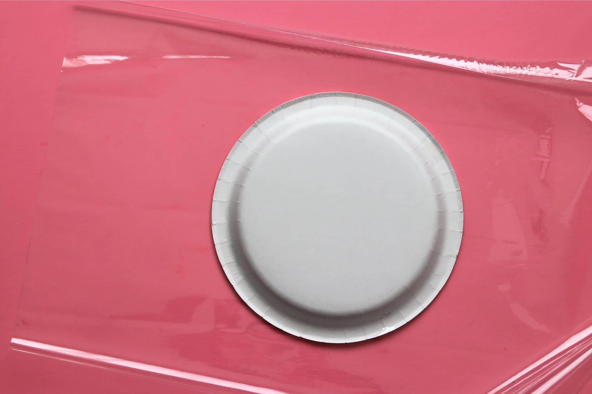 Make a peppermint candy from paper plates - A girl and a glue gun