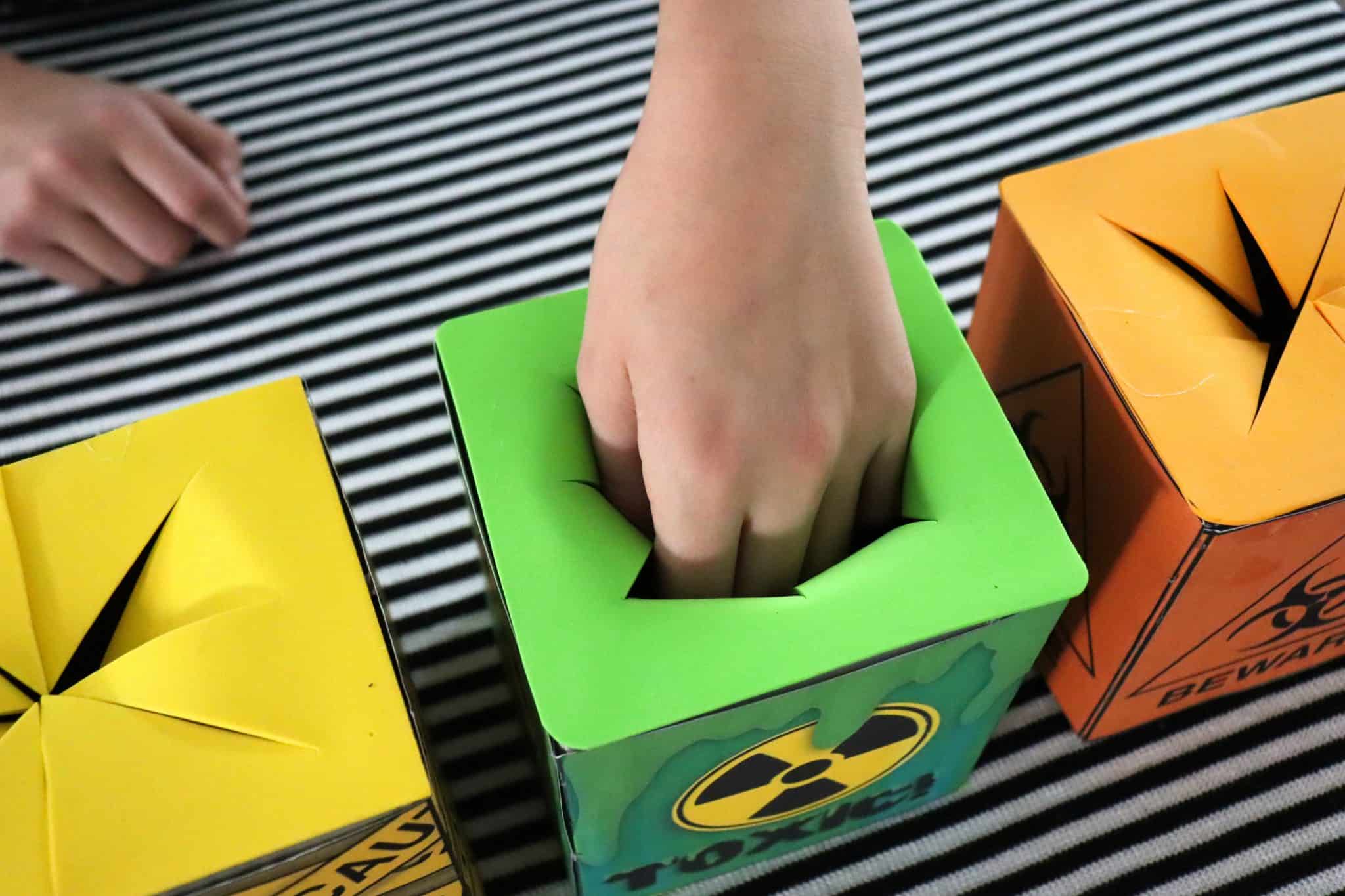 Gross Halloween sensory game - A girl and a glue gun