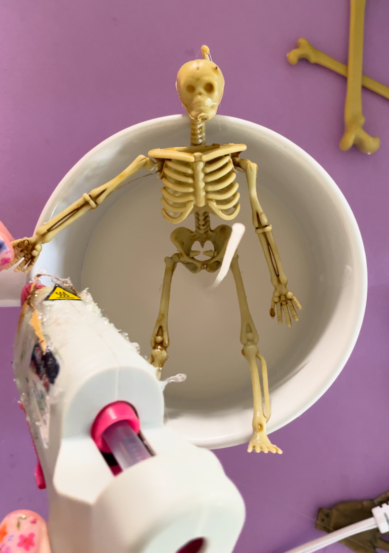 Dollar Tree Skeleton Candle - A girl and a glue gun