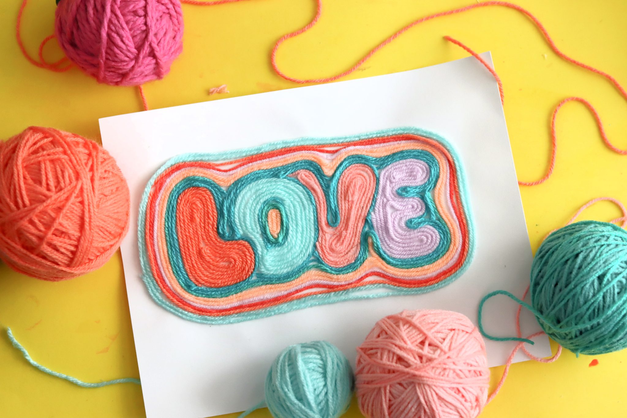 Kid's craft Yarn art - A girl and a glue gun