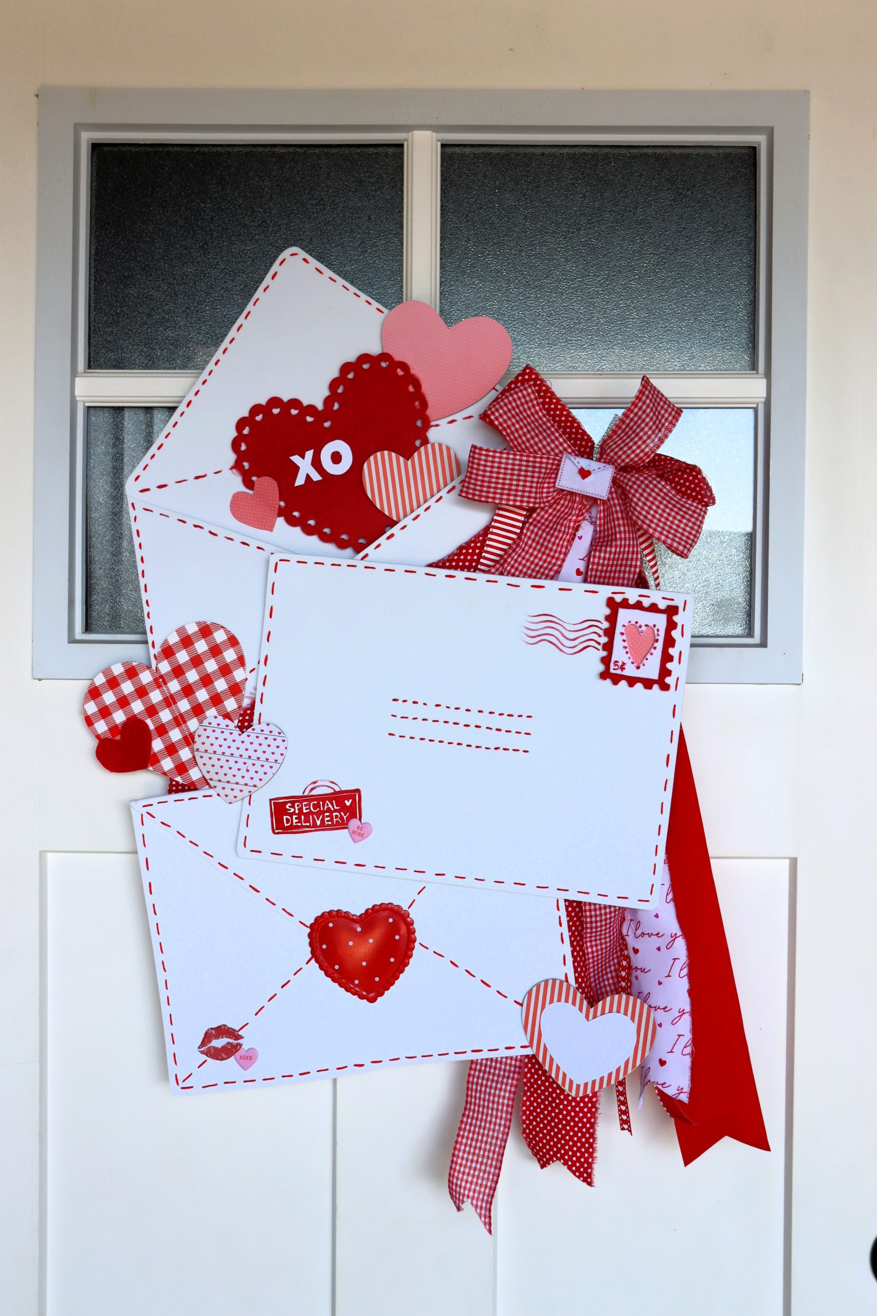 DIY Foam Envelope Door Hanger for Valentine’s Day - A girl and a glue gun